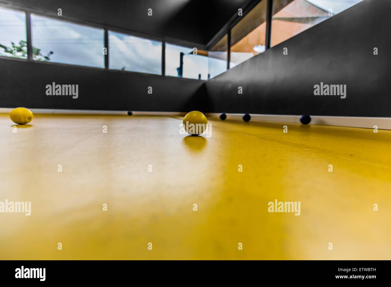 yellow and black balls closeup on the floor Stock Photo - Alamy