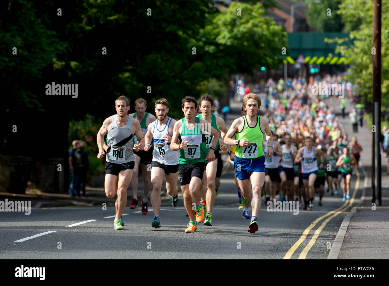 Runners leading a 10K road race Stock Photo - Alamy
