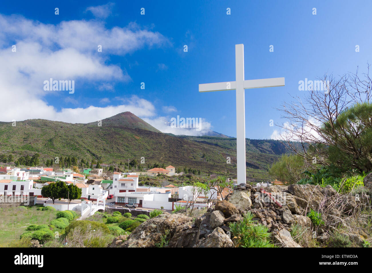 Summer mountain view with white wooden cross. It's standing on hill in ...