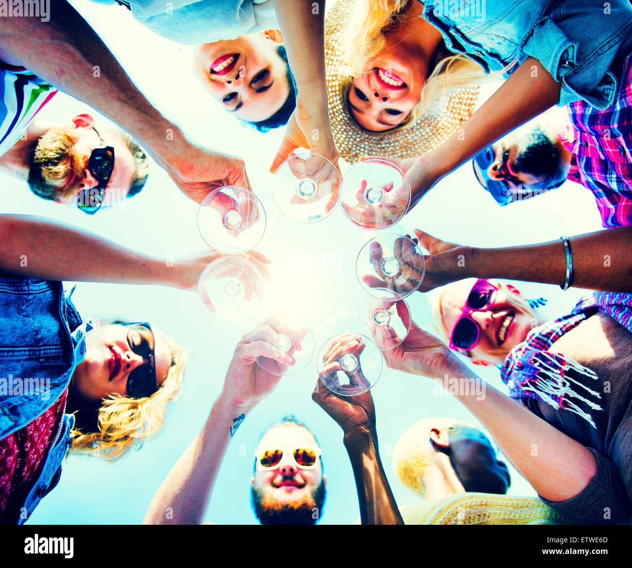 Friends drinking champagne cheers hi-res stock photography and images ...