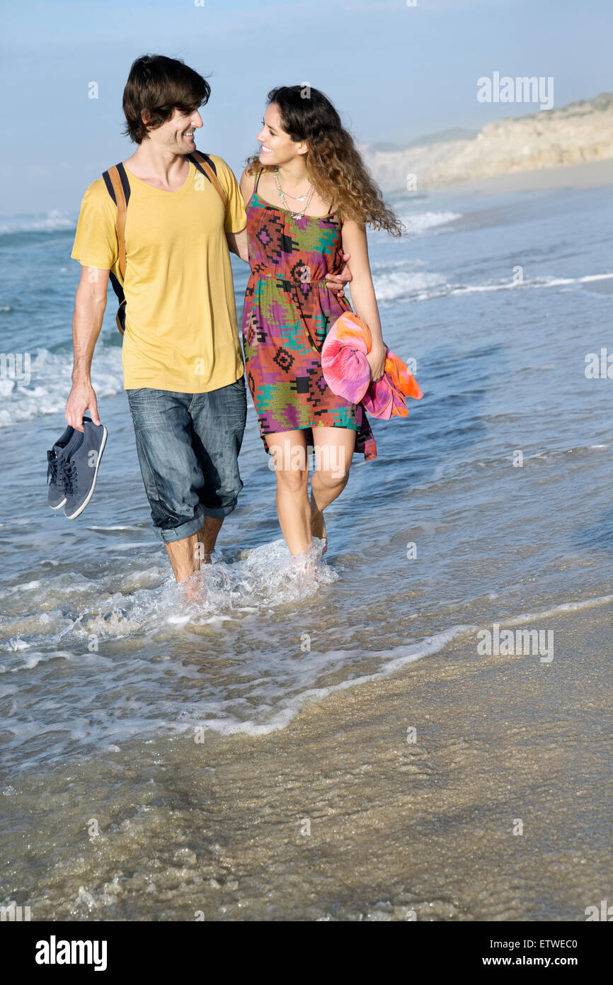 South Africa, happy couple wading in the ocean Stock Photo - Alamy
