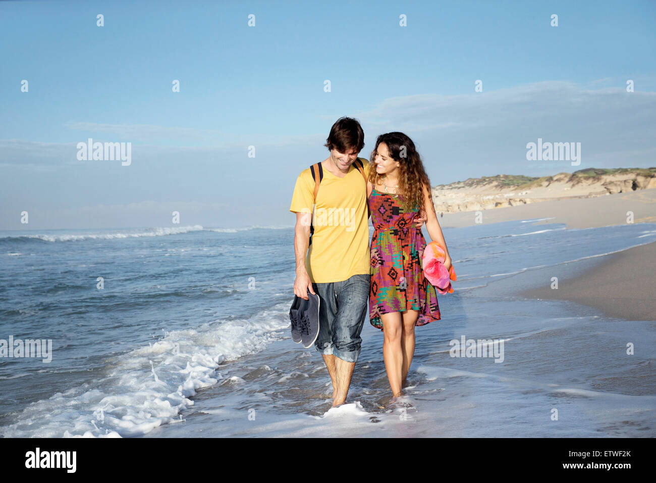 South Africa, happy couple wading in the ocean Stock Photo - Alamy