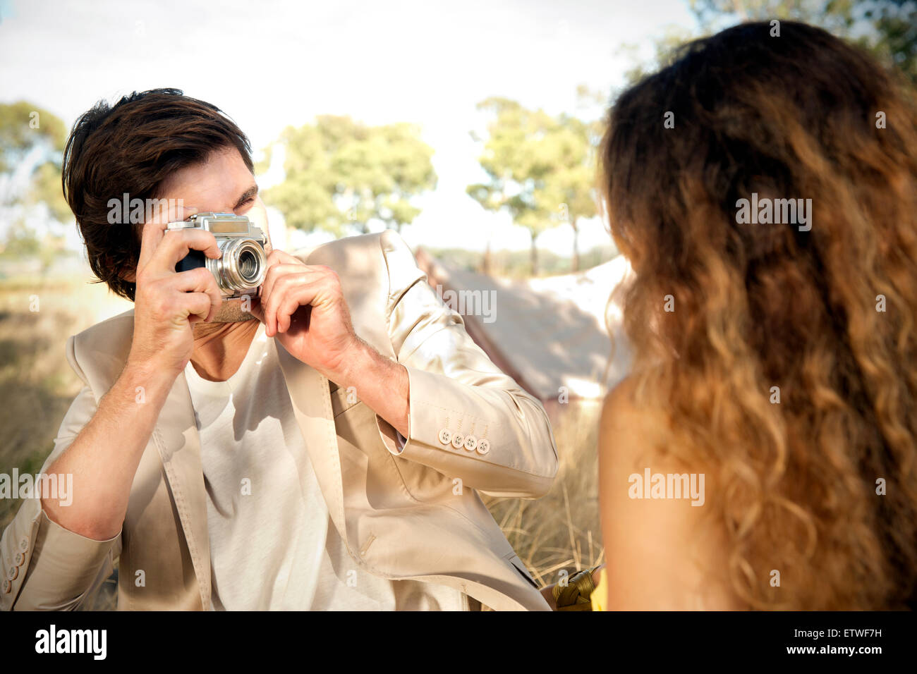 South Africa, man photographing his girlfriend Stock Photo - Alamy