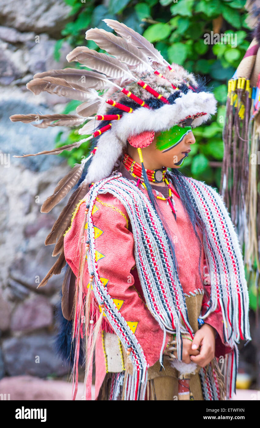 Native American with traditional costume participates at the festival ...
