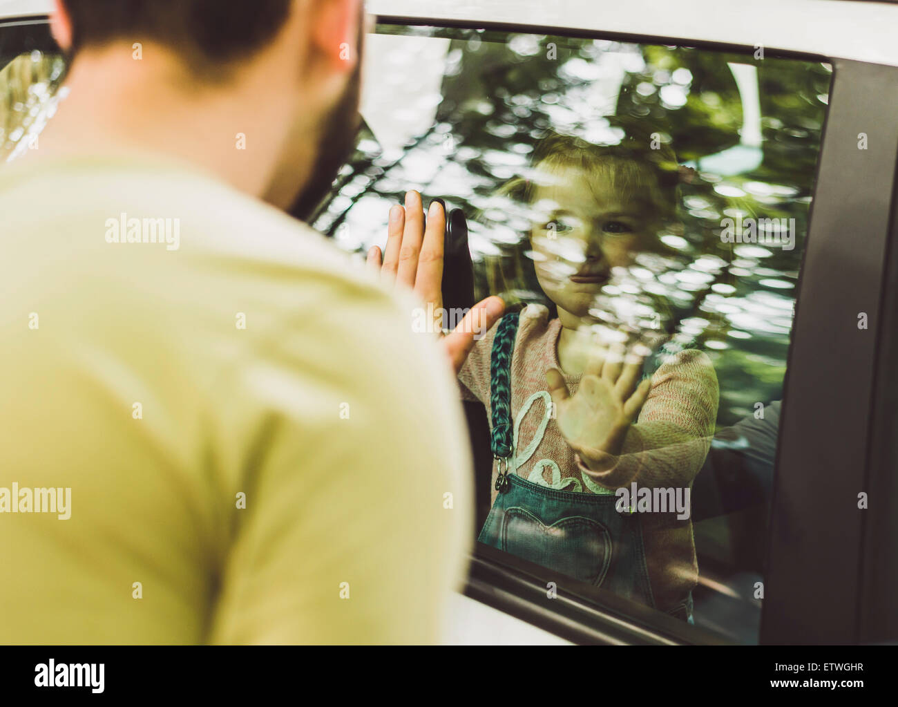 Hand touching glass pane hi-res stock photography and images - Alamy