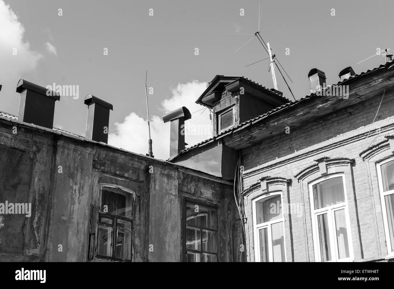 Red brick house blue sky Black and White Stock Photos & Images - Alamy