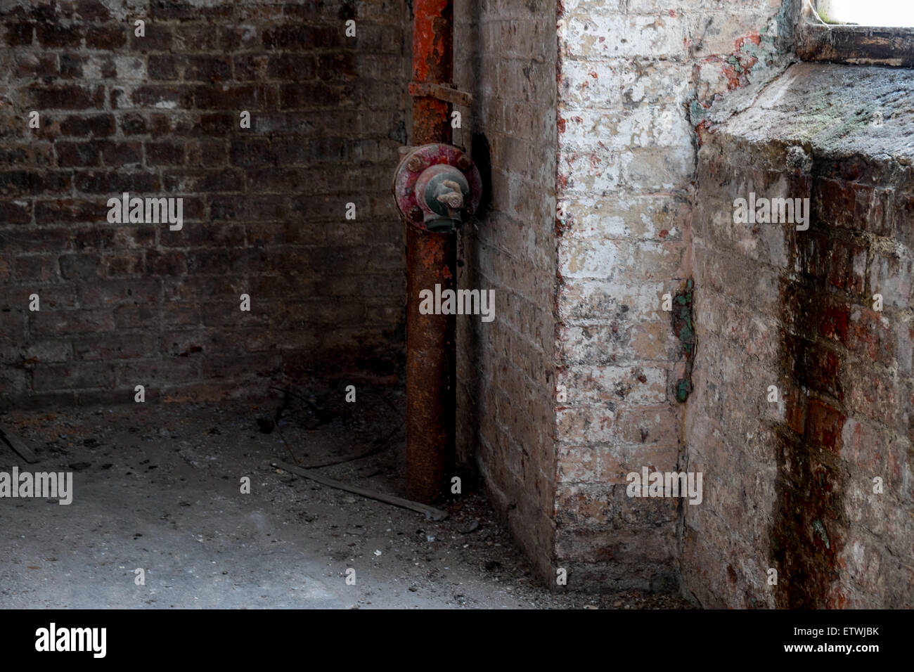 Rusty mains water inlet pipe to the disused factory Stock Photo - Alamy