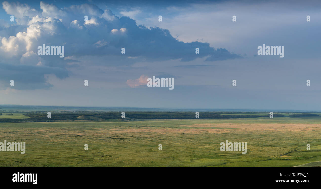 Large brooding rain clouds gather over empty prairieland Stock Photo ...