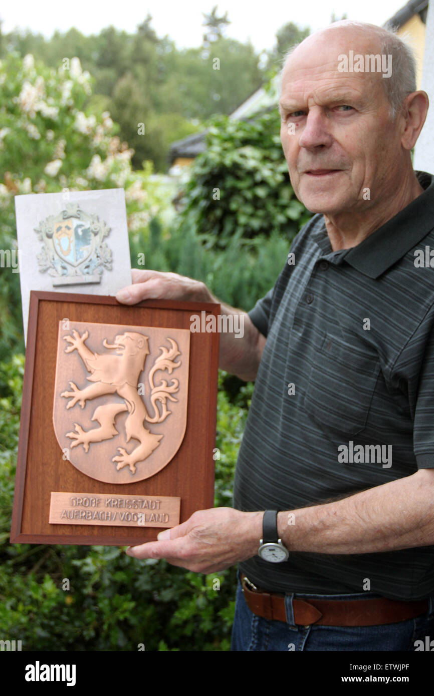 Auerbach, Germany. 08th June, 2015. Herbert Gall shows off the crests ...