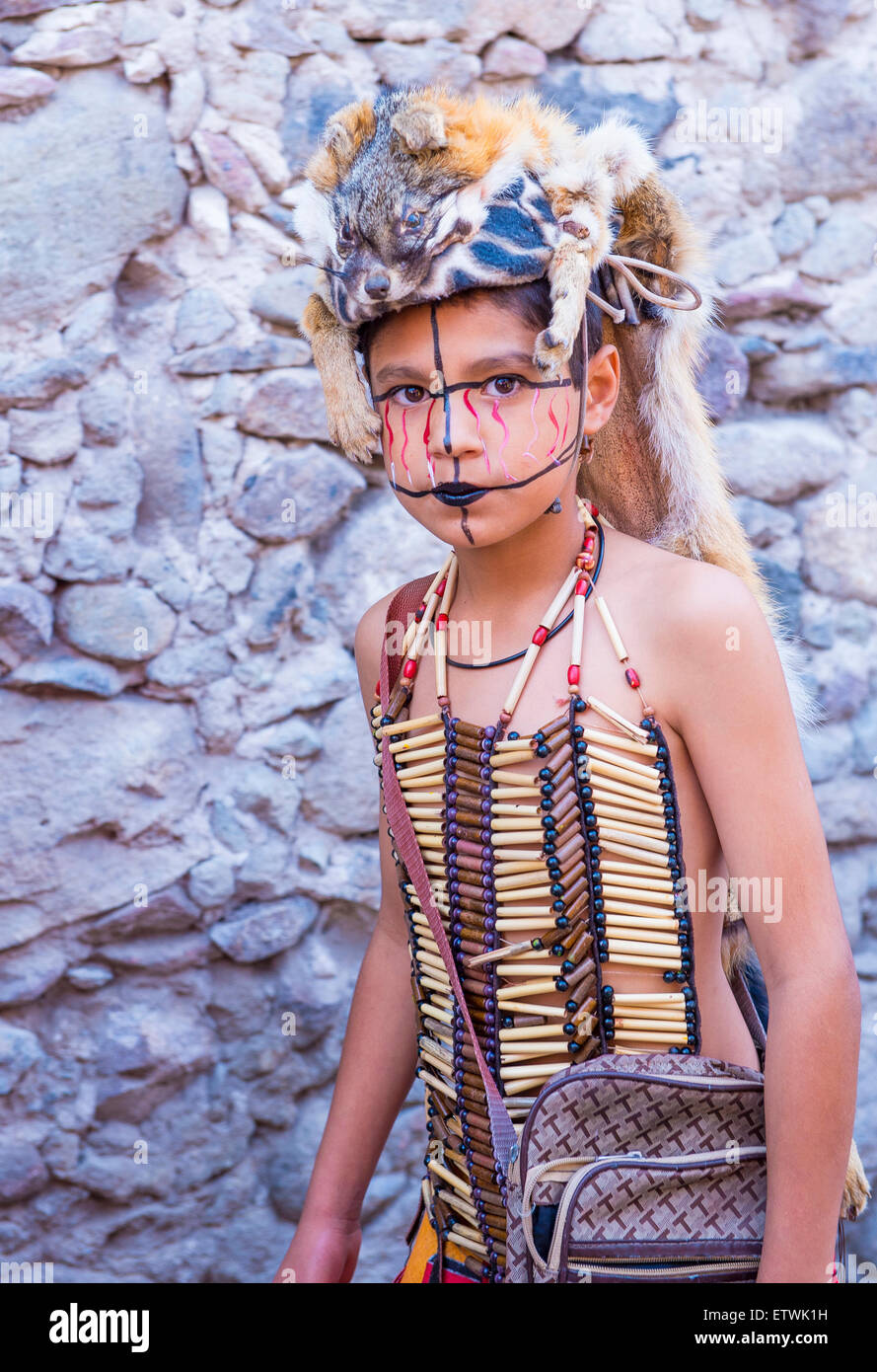 Native American boy with traditional costume participates at the ...