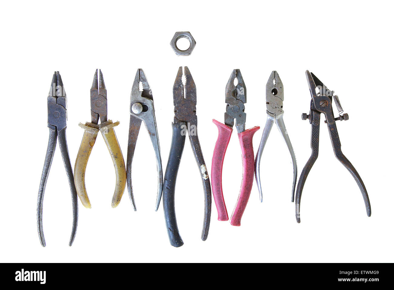 group of vintage pliers teamwork turning nut on white background Stock ...