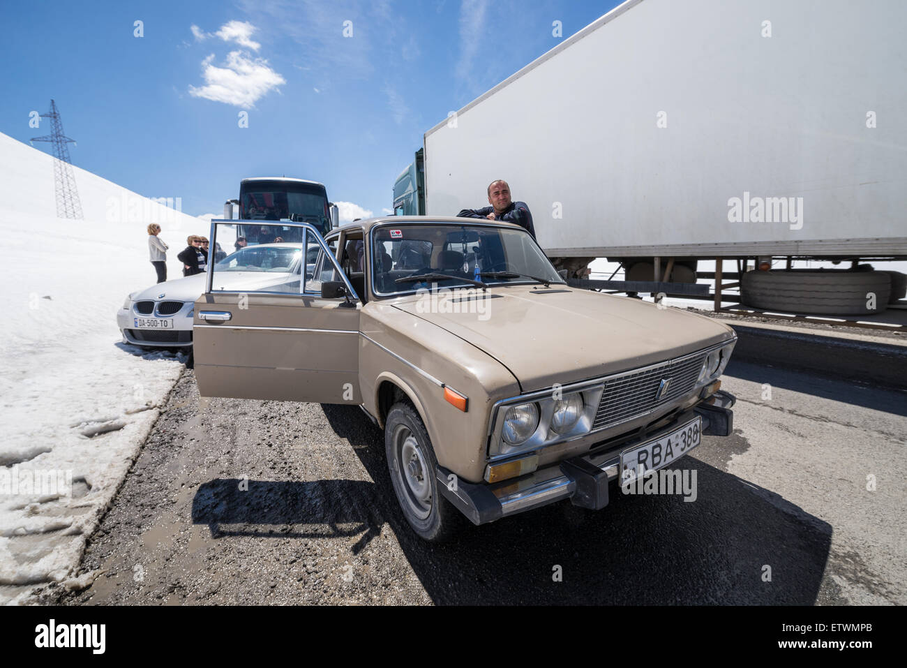 Driver with his Lada 1600 (VAZ 2106) car waiting in queue on Georgian ...