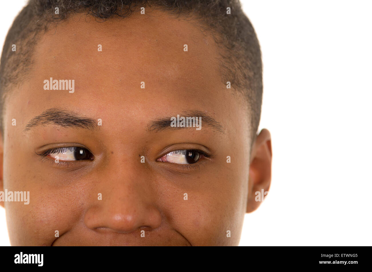 Headshot of hispanic male model eyes looking sideways Stock Photo - Alamy