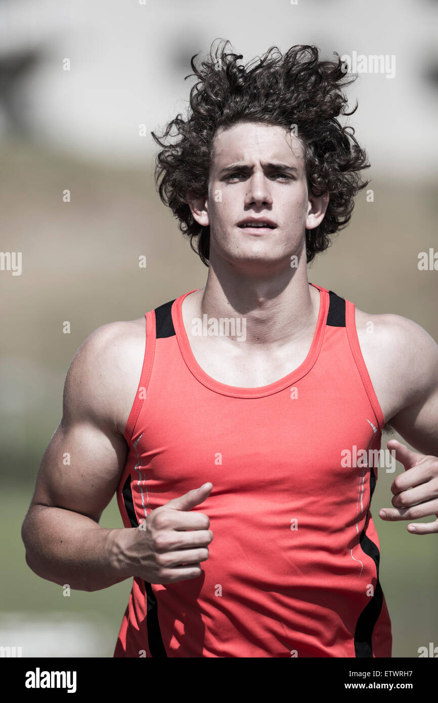 Portrait of running sportsman Stock Photo - Alamy