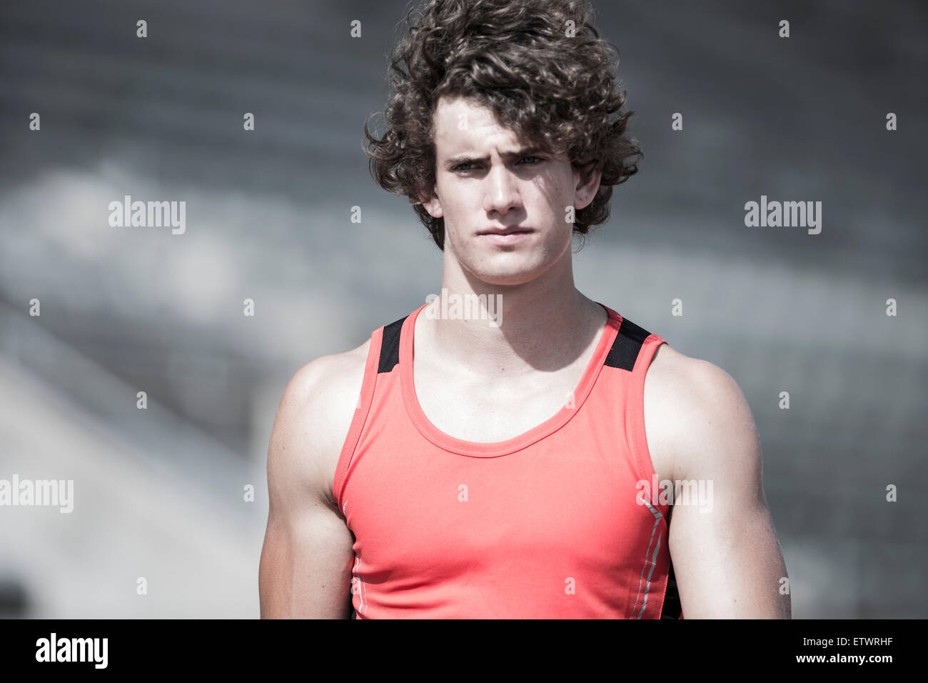 Portrait of young sportsman Stock Photo - Alamy