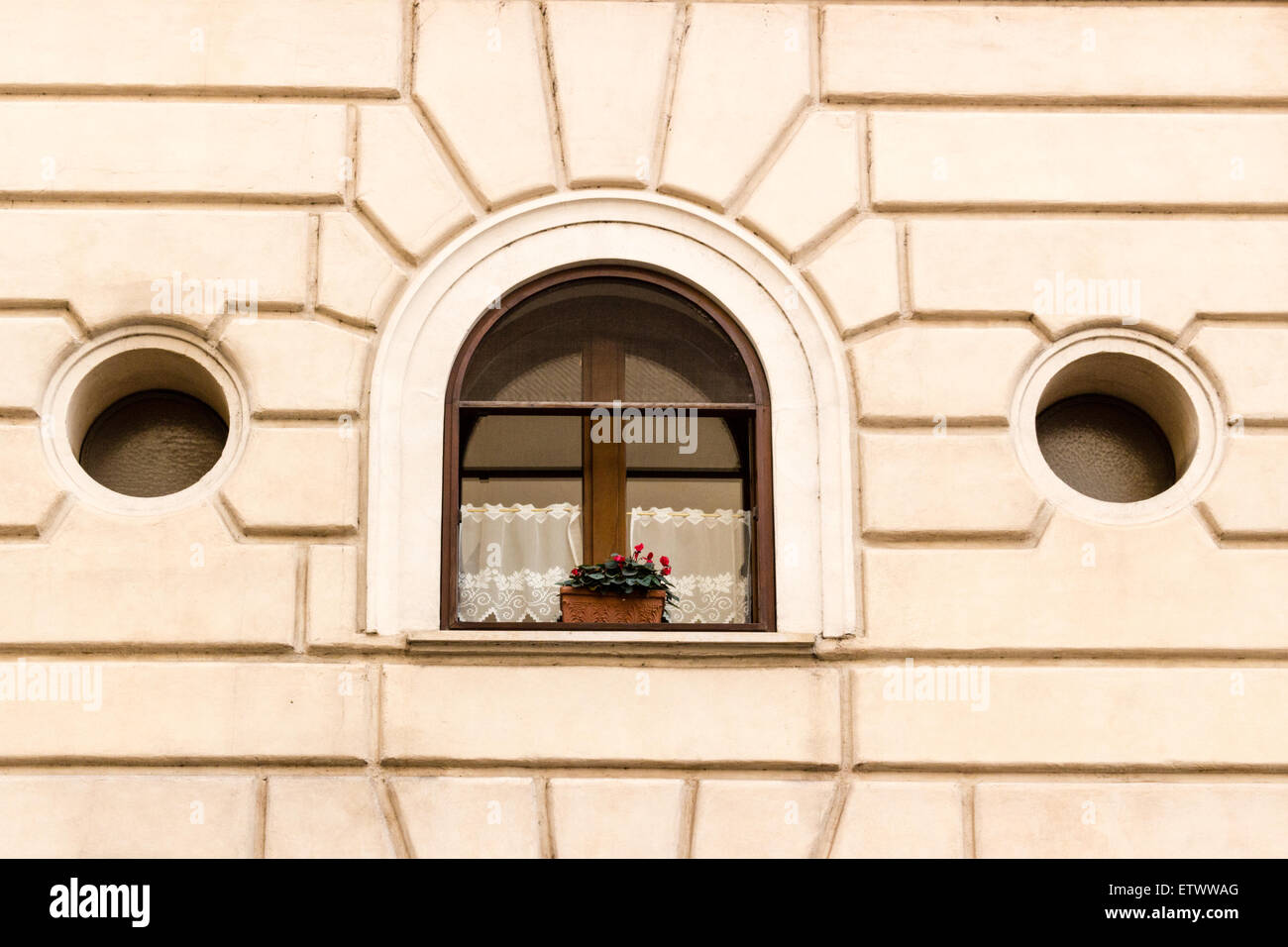 Window of historical building in the center of Rome with flowers Stock ...