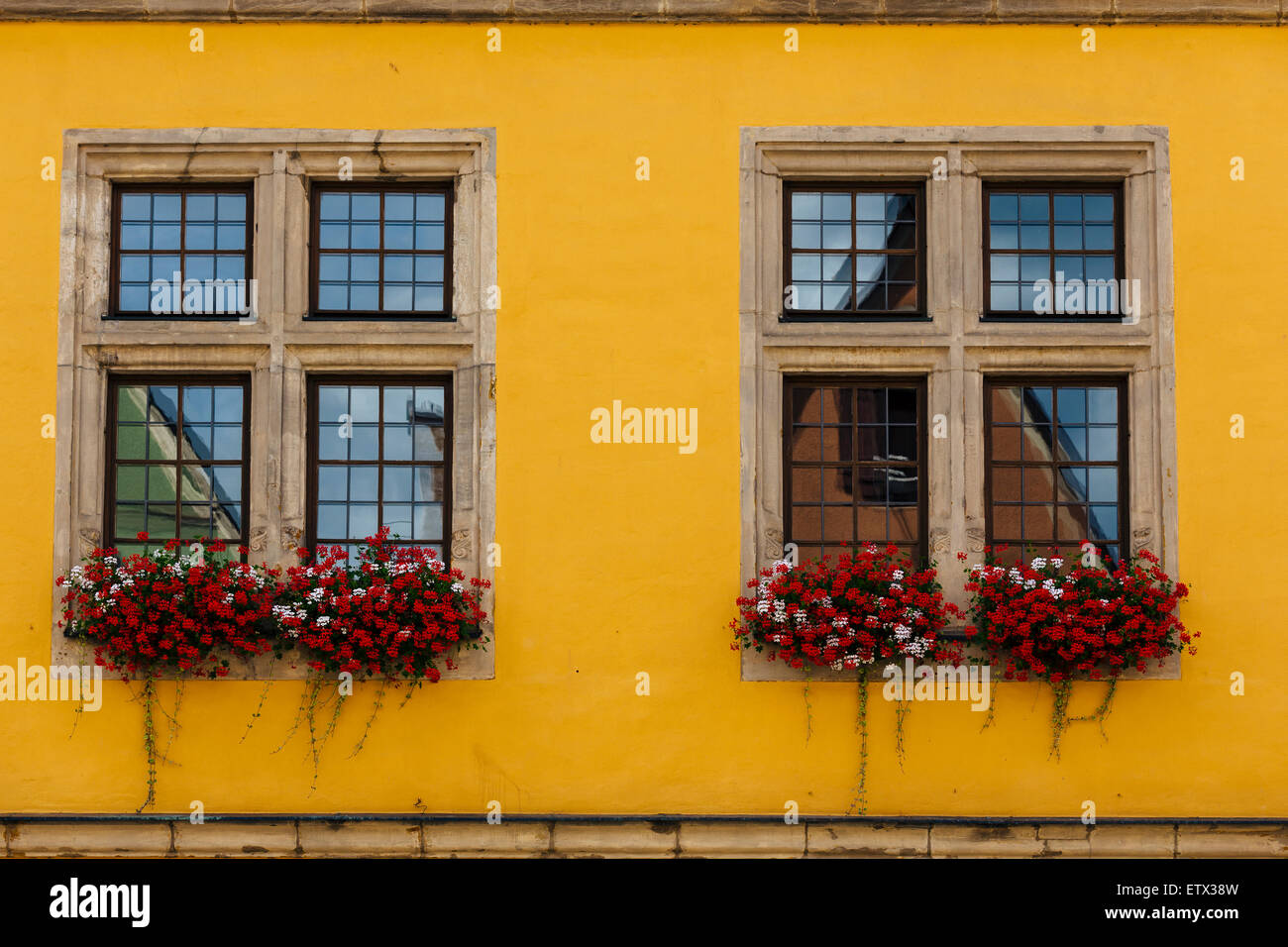 Close-up of windows with flower boxes on house in Dinkelsbuhl altstadt ...
