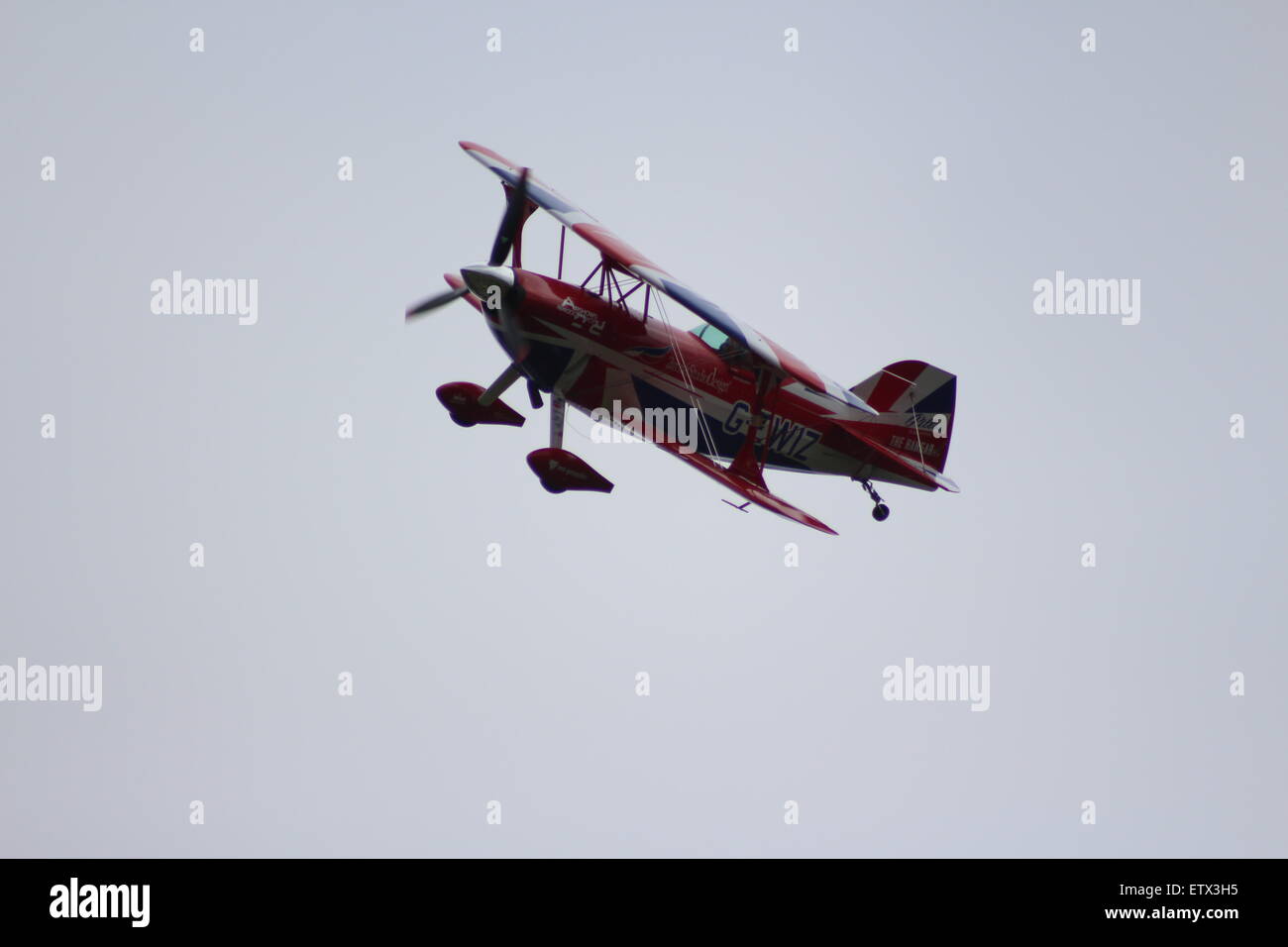 Airshow biplane airplane smoke aerobatics hi-res stock photography and ...