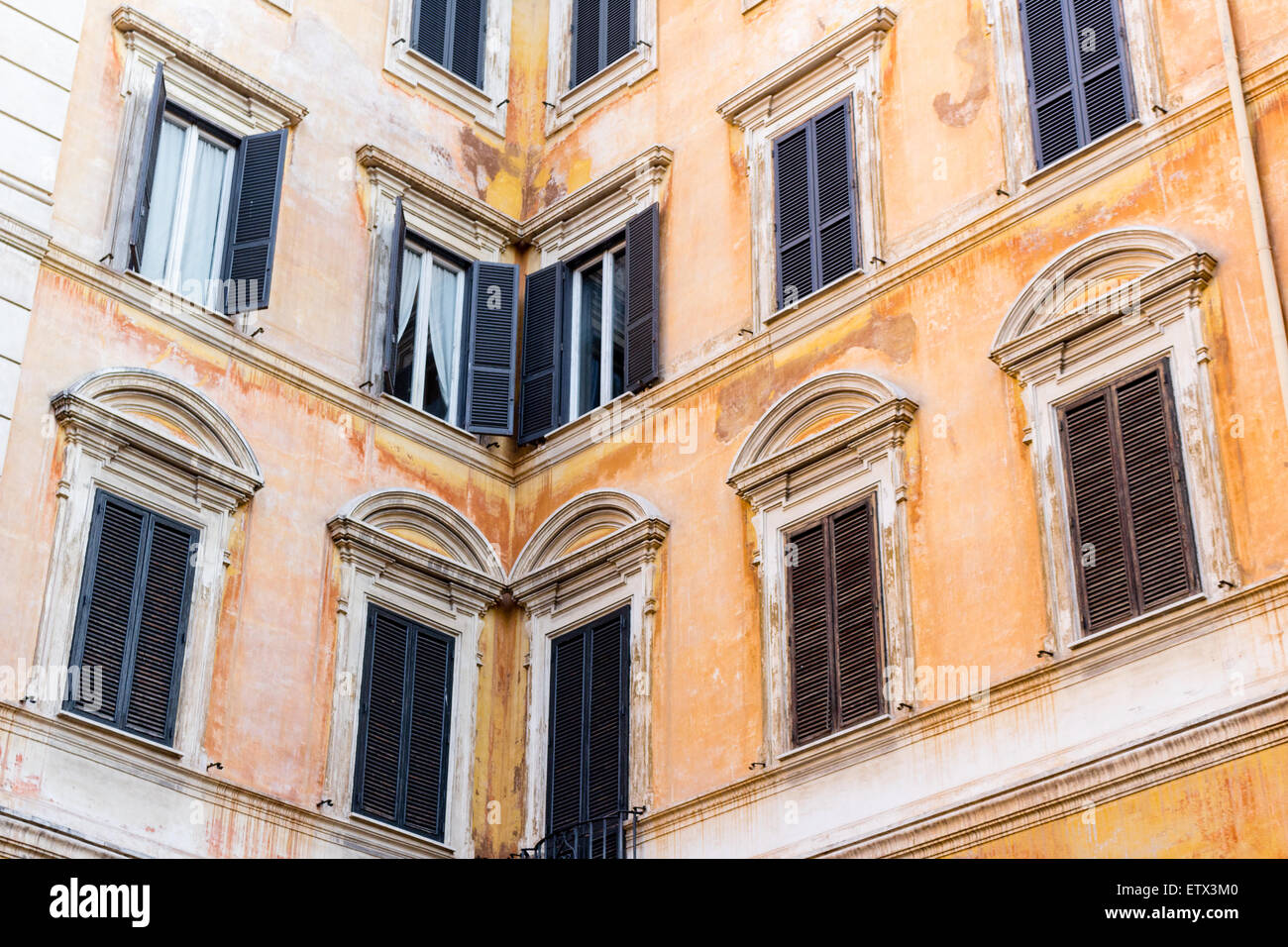 Windows of historical building in the center of Rome Stock Photo - Alamy