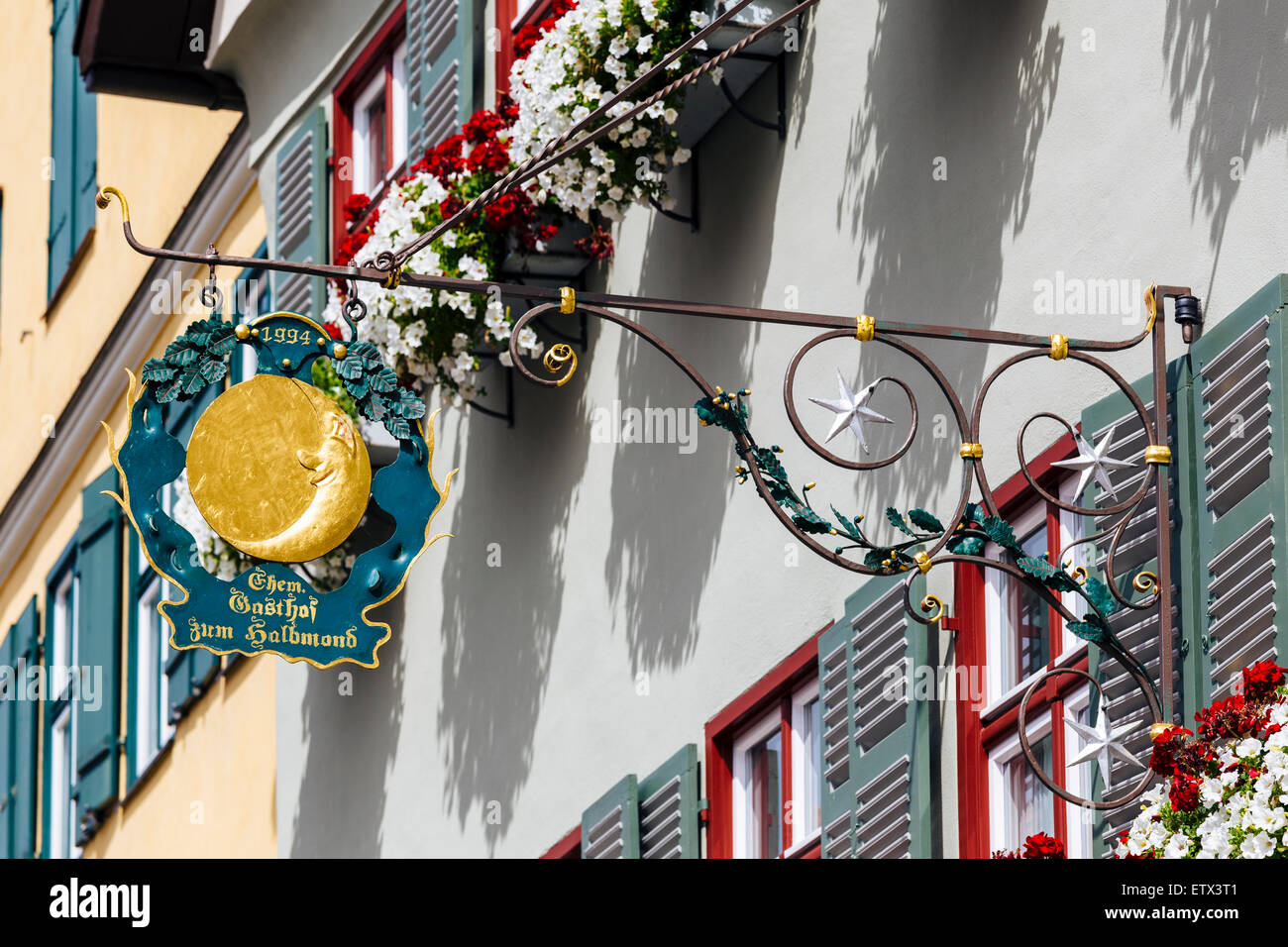Traditional shop sign hanging outside hi-res stock photography and ...