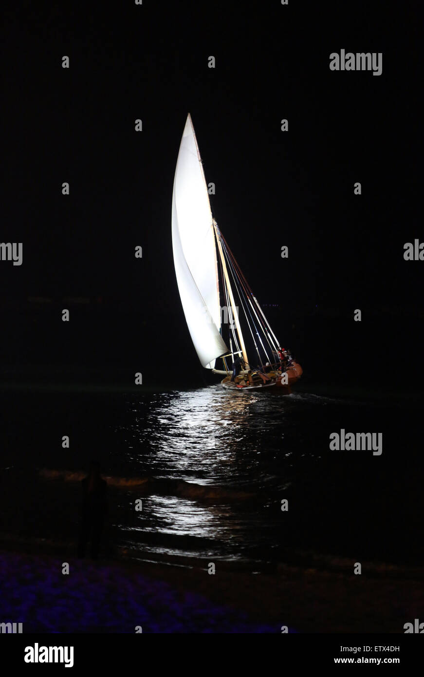 Dubai, United Arab Emirates, sailboat at night on the sea Stock Photo ...