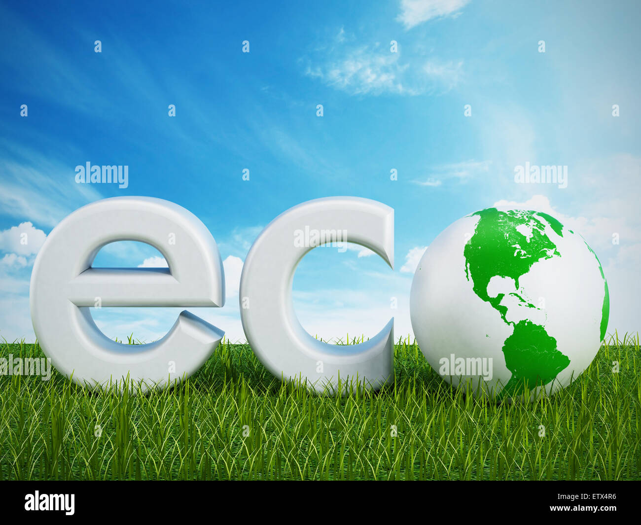 Eco text with globe on grass against blue sky Stock Photo - Alamy