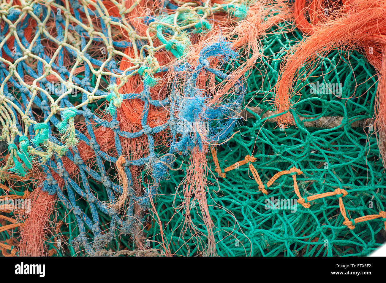 Worn out fishing nets hi-res stock photography and images - Alamy