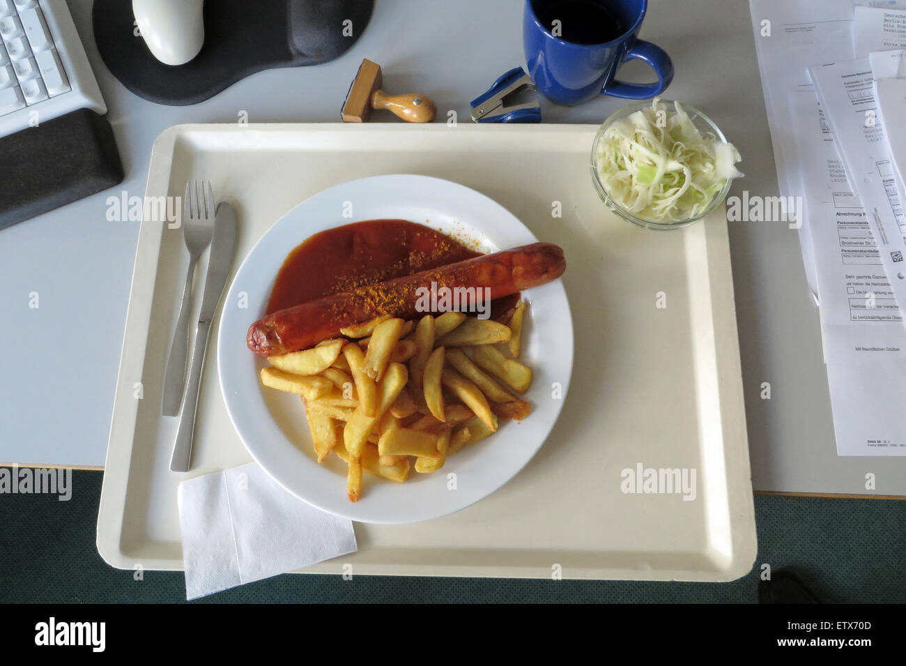 Berlin, Germany, lunch in the office, Currywurst with fries and ...