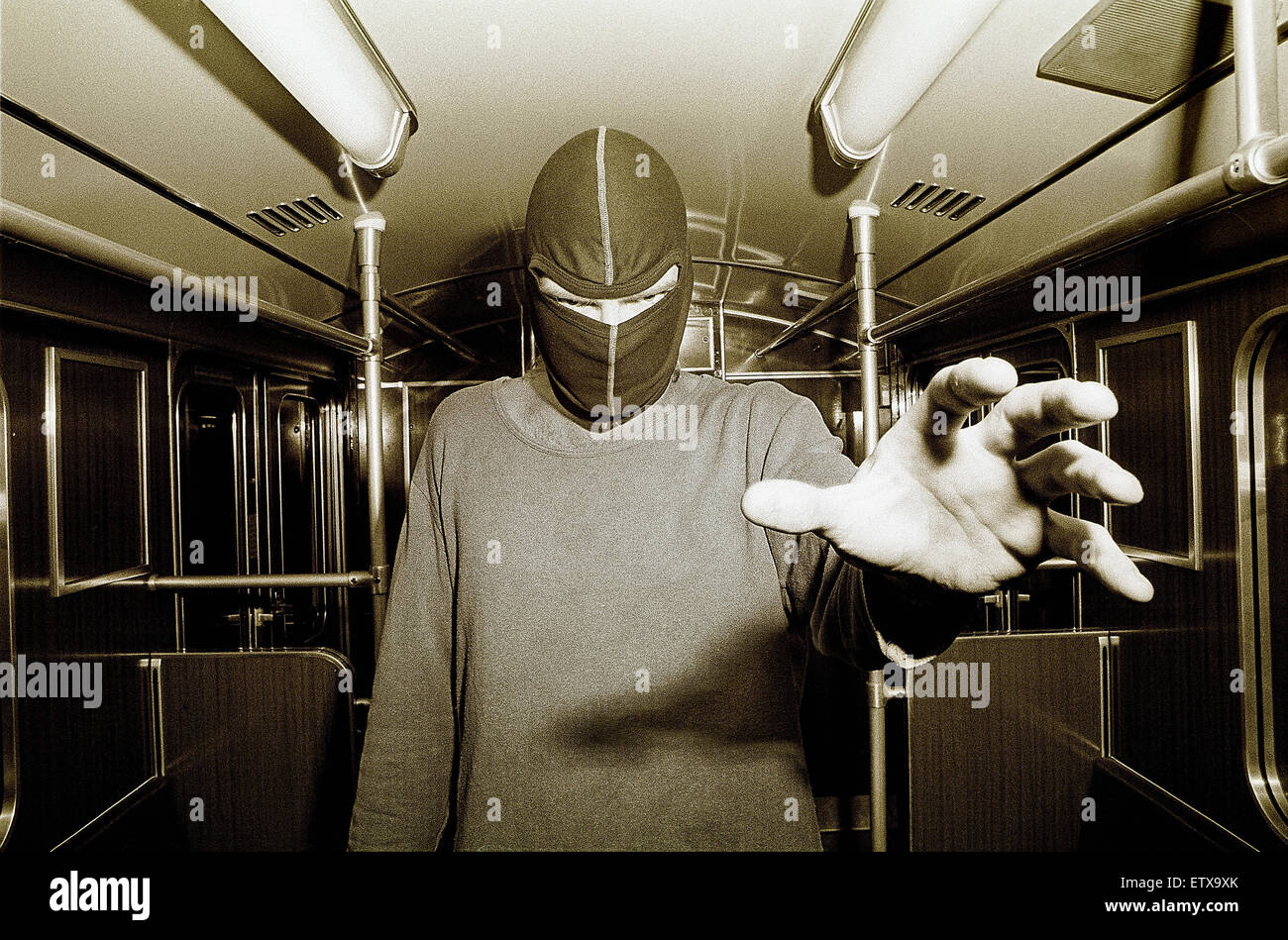 Hamburg, Germany, Man with mask in underground stretches of cross-Hand ...