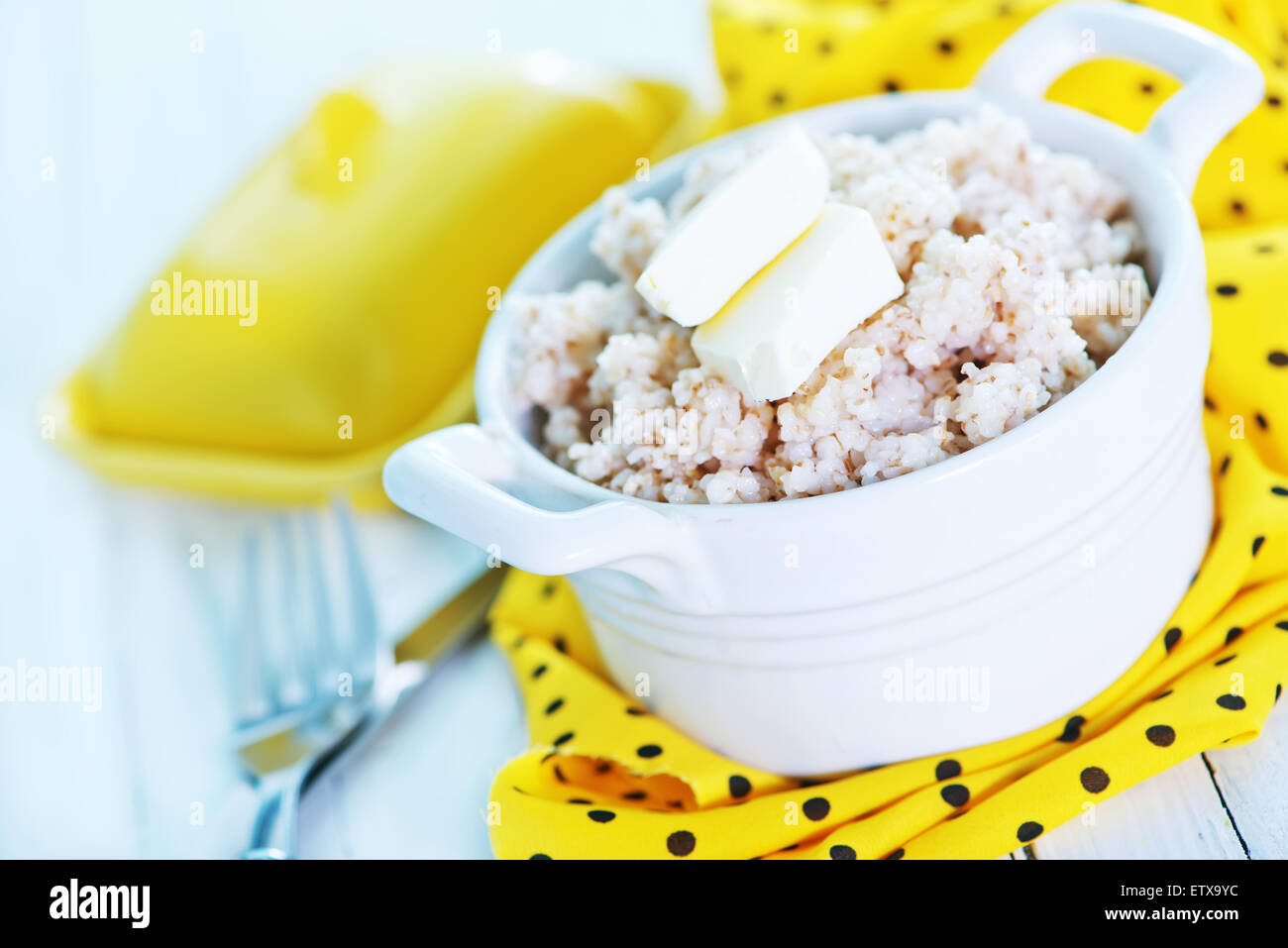 boiled porridge with butter in the bowl Stock Photo - Alamy