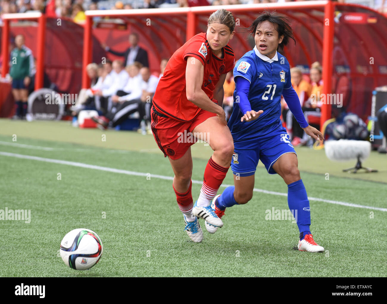 Germany's Annike Krahn (L) vie for the ball against Thailand Kanjana ...