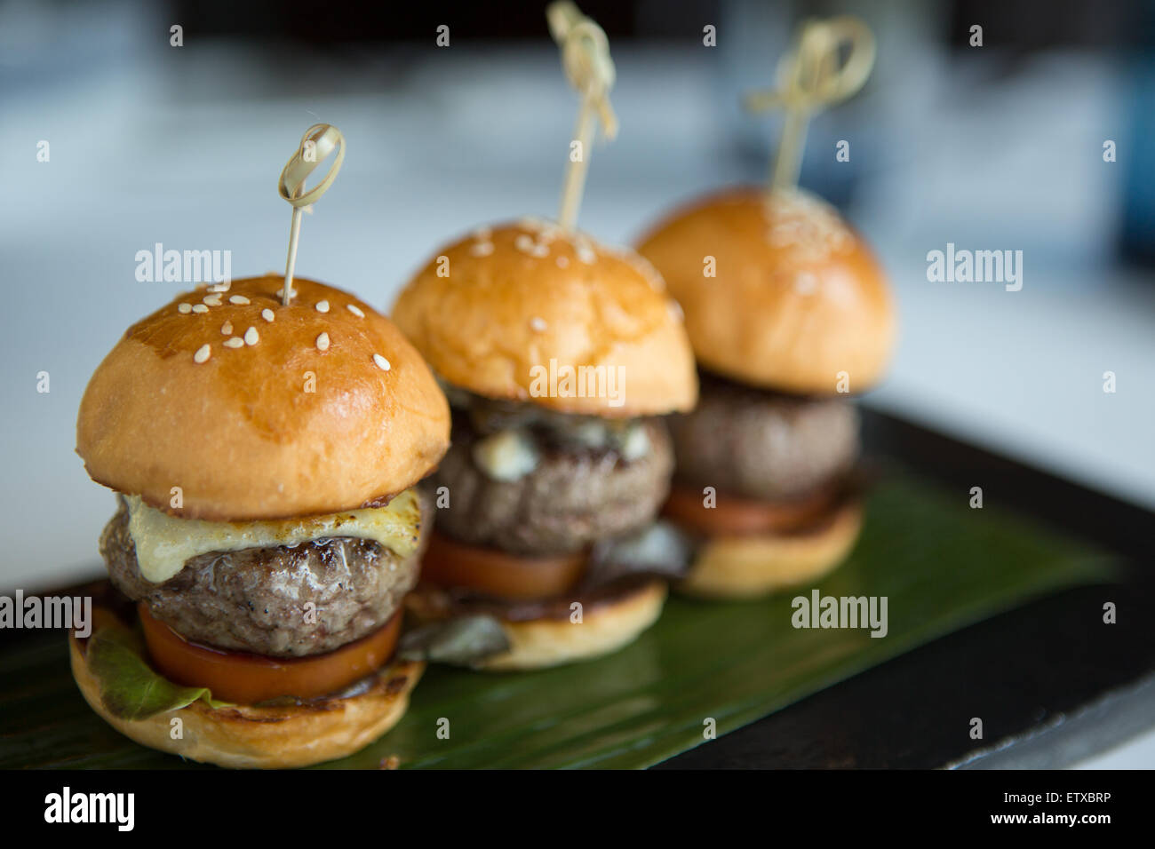 Burger trio hi-res stock photography and images - Alamy