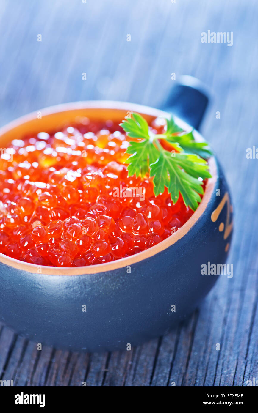 red salmon caviar in bowl and on a table Stock Photo - Alamy