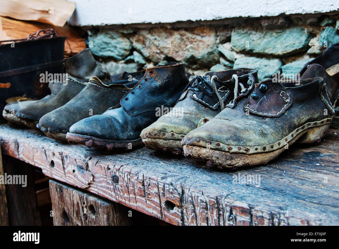 old shoes made of leather wood and nails Stock Photo - Alamy