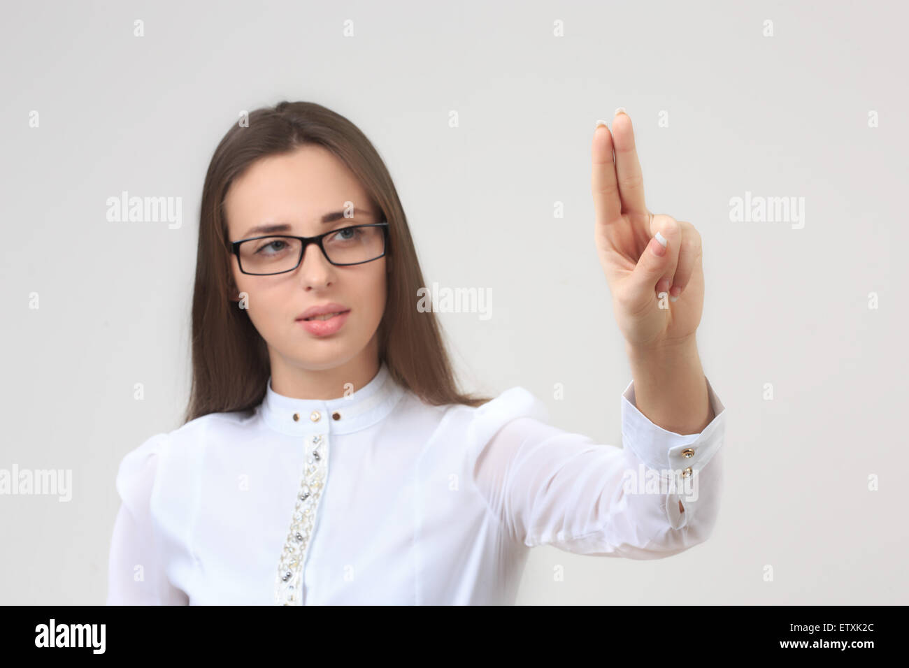 business woman finger pointing at the side Stock Photo - Alamy