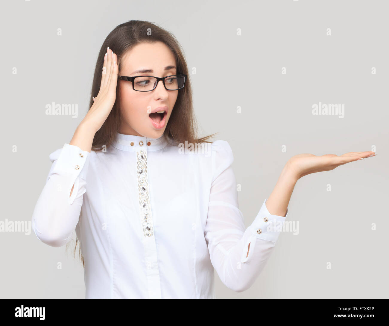 young girl shows on the palm Stock Photo - Alamy