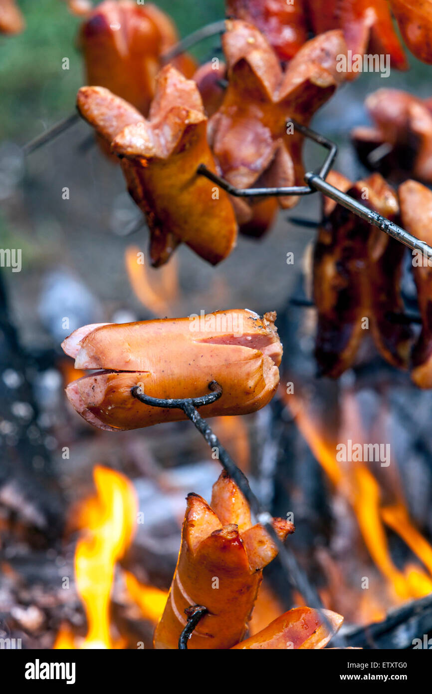 Roasting sausages on fire hi-res stock photography and images - Alamy