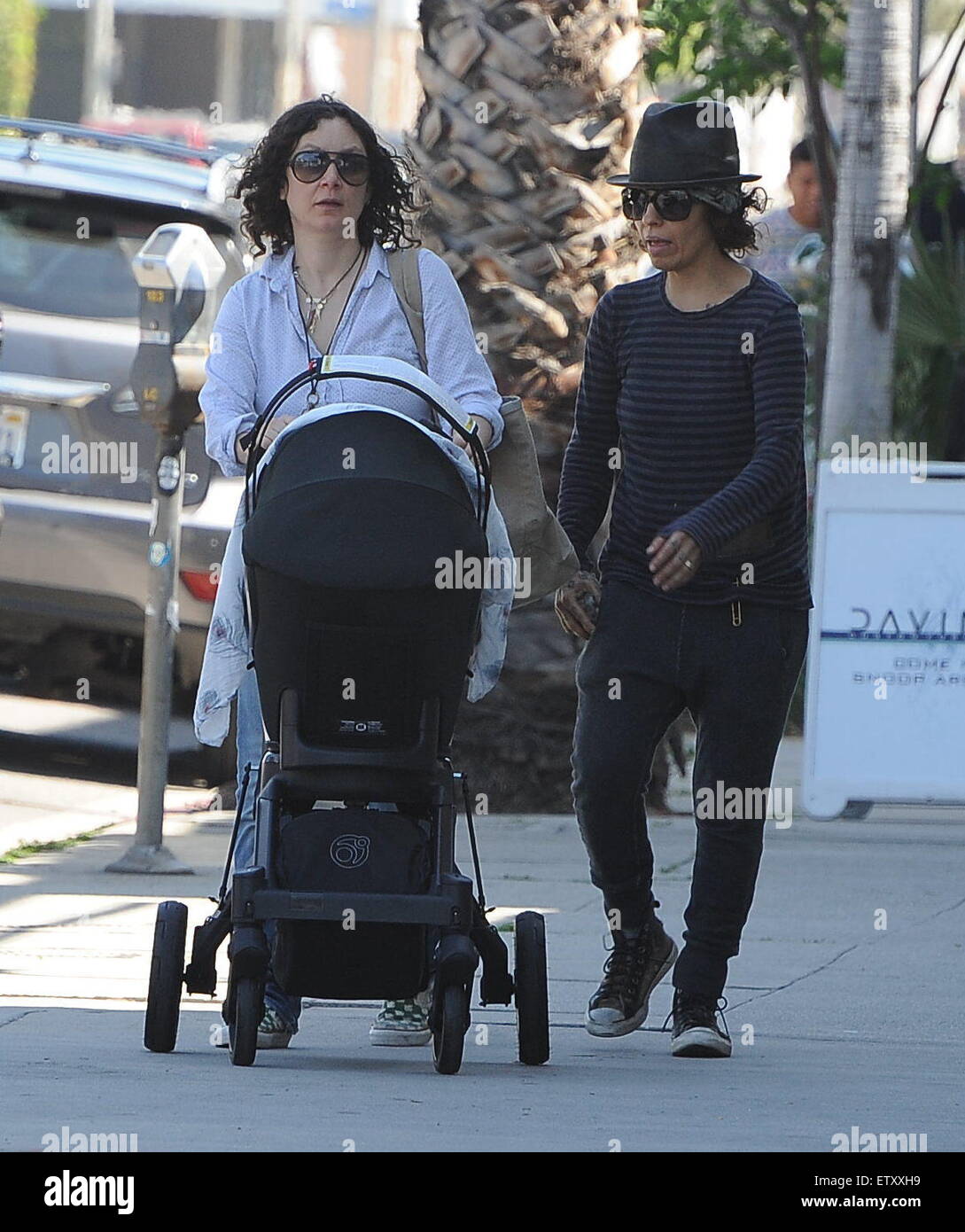 Sara Gilbert and Linda Perry out and about with their newborn baby in ...