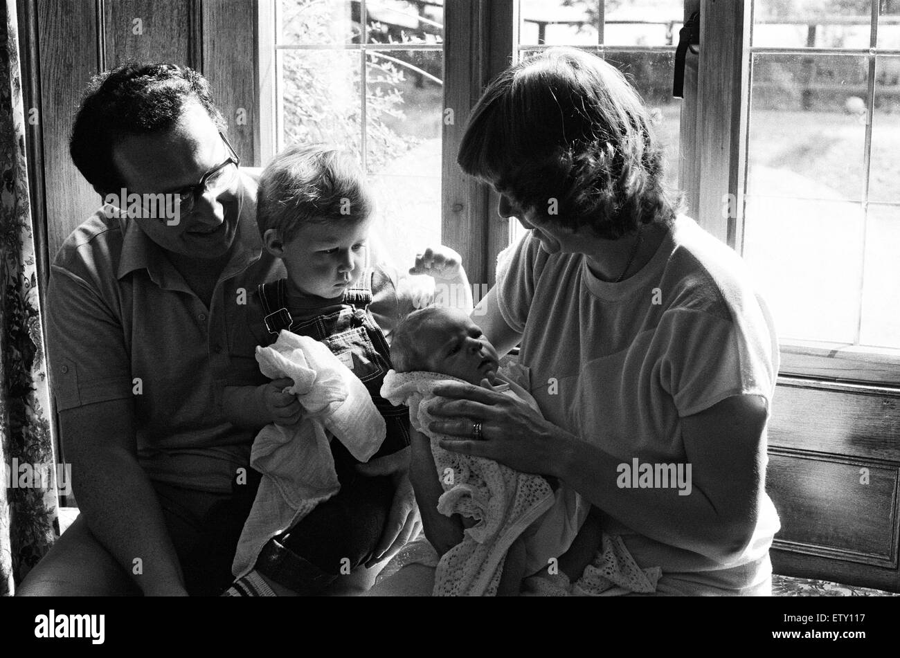 Poet Pam Ayres is pictured with her newborn baby James, son William and ...