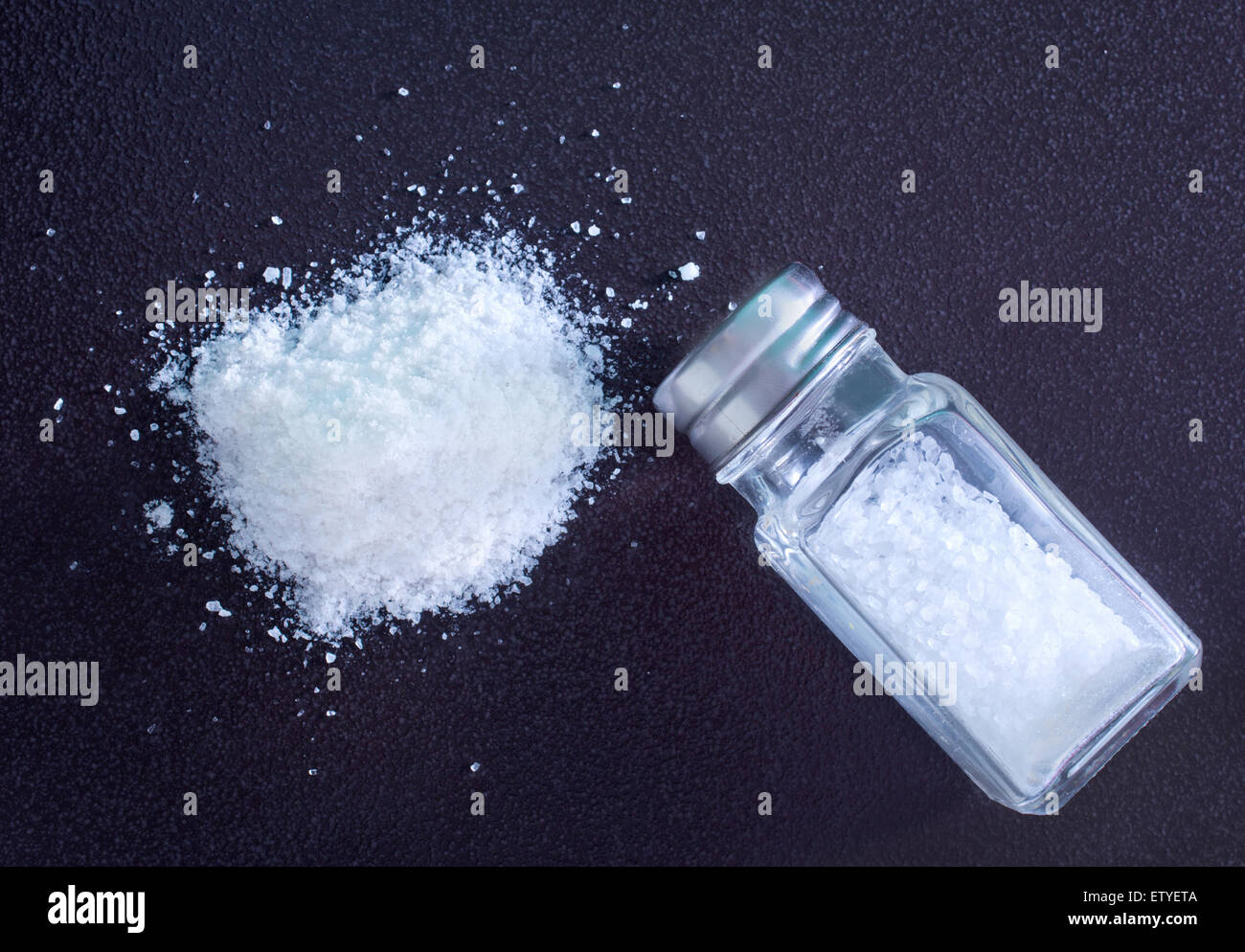 white sea salt in the glass bottle Stock Photo - Alamy