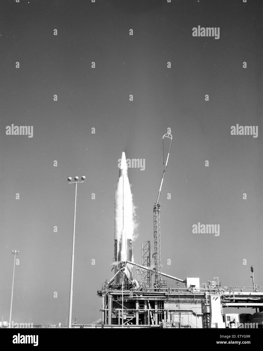 A photograph capturing the lift-off of the Atlas 32E rocket. This ...