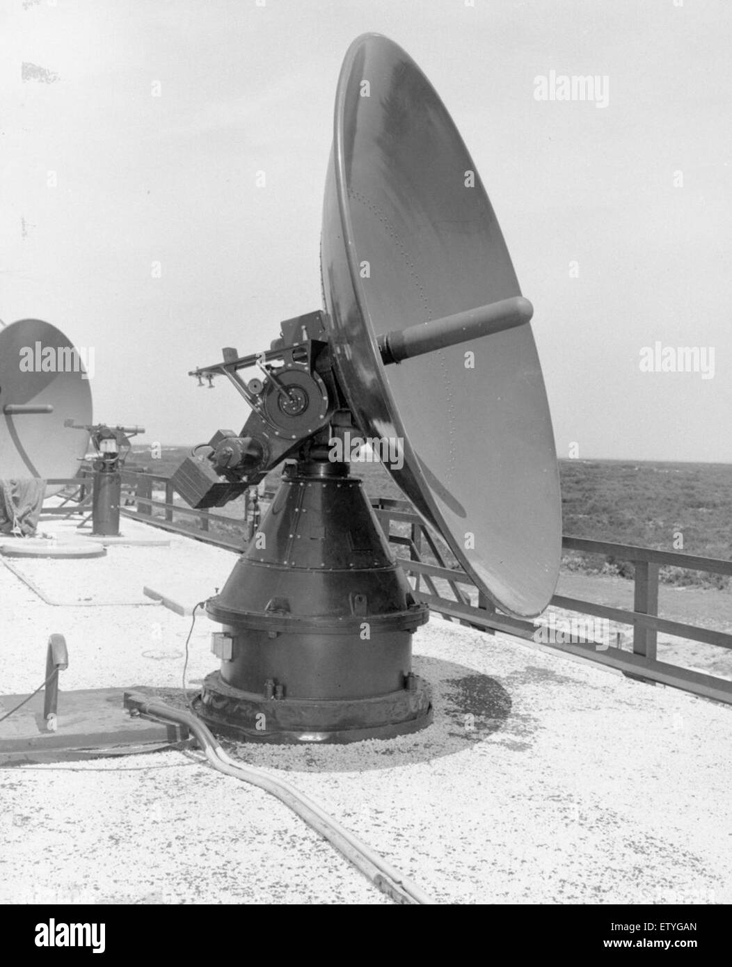 This photograph features a Model II radar dish, located on the central ...
