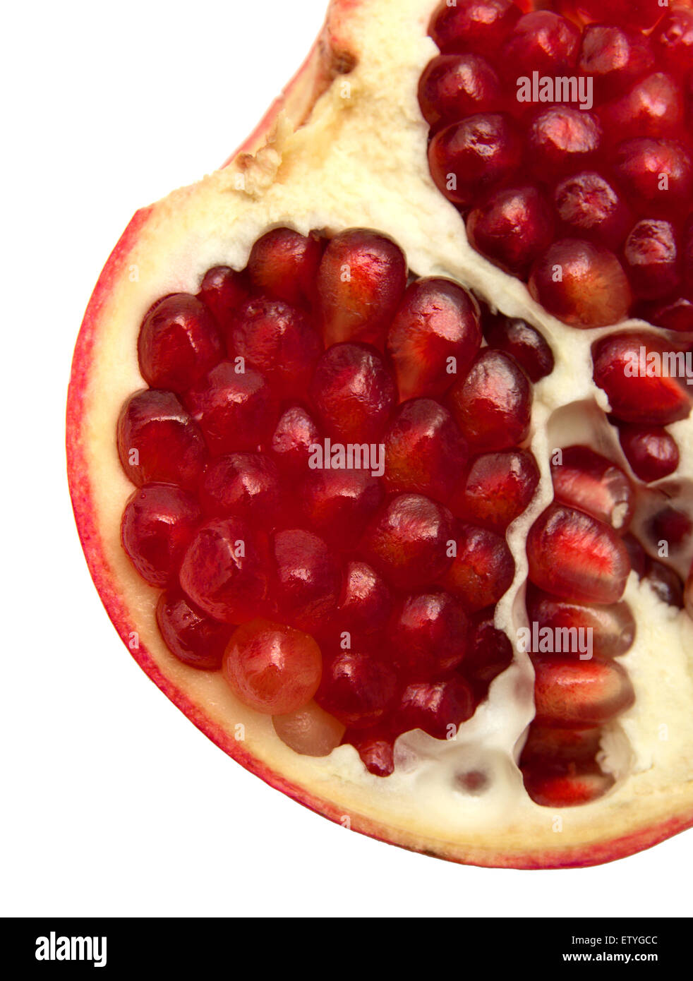 pomegranate fruit split in two, isolated on white background Stock ...