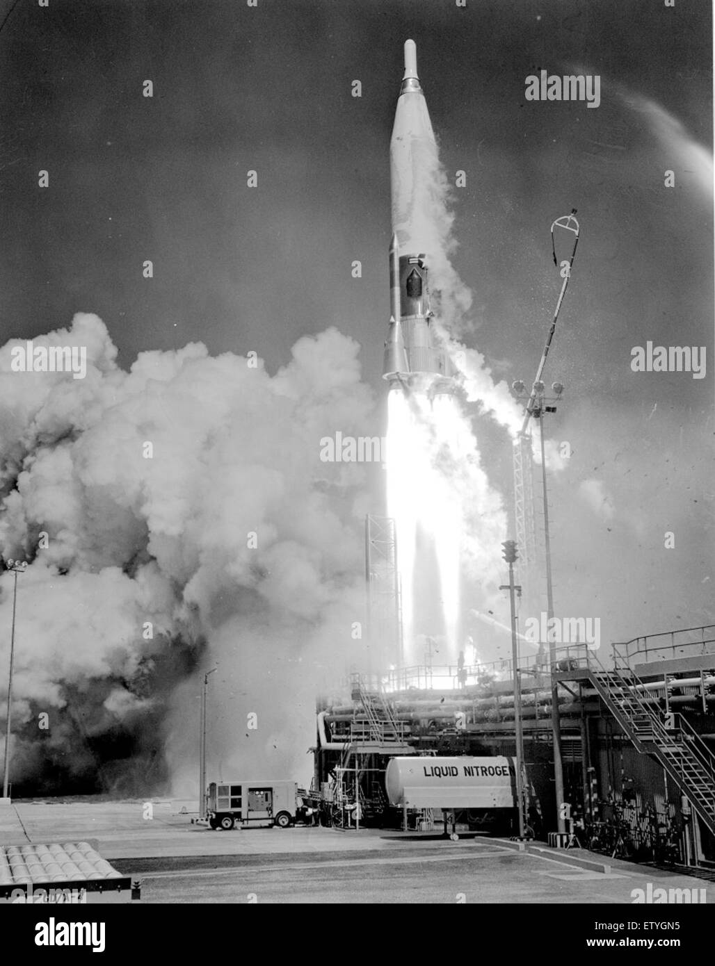A technical photograph showing the Atlas missile in its launch support ...
