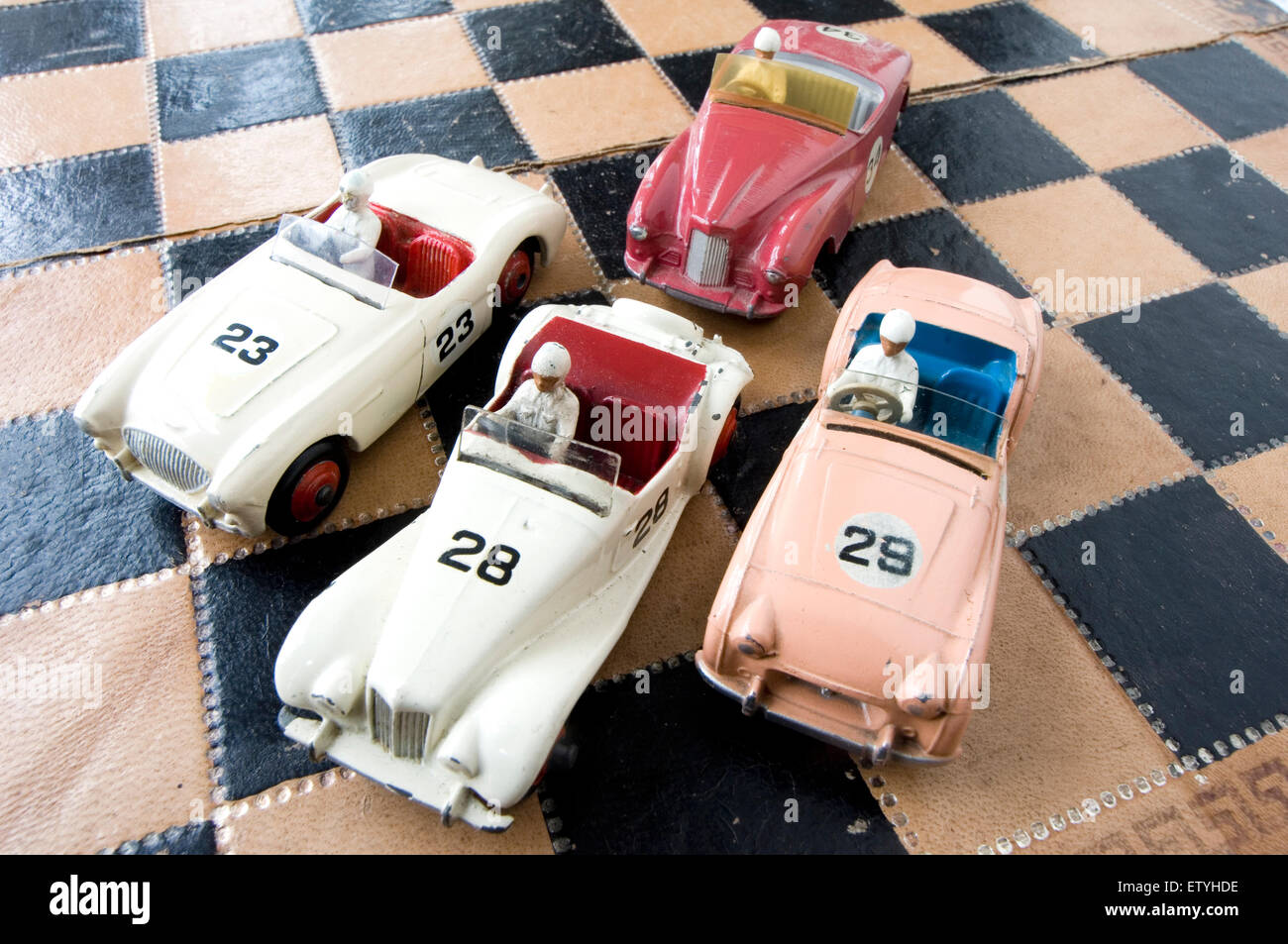 Dinky toy cars racing over a chess board Stock Photo - Alamy