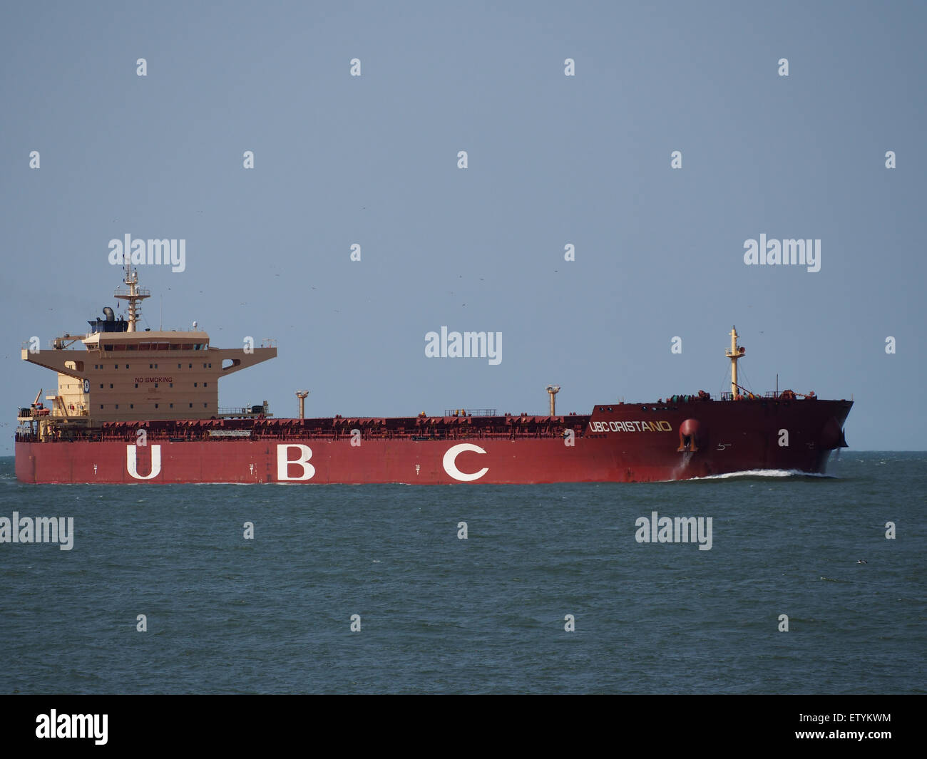 The image shows the UBC Oristano, an oil container ship at the Port of ...