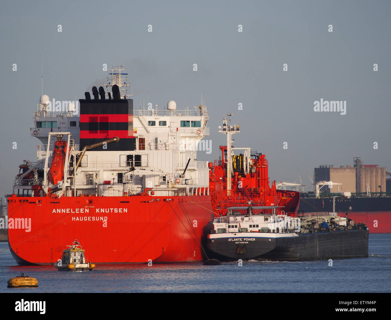This image shows the ships Anneleen Knutsen and Atlantic Power docked ...