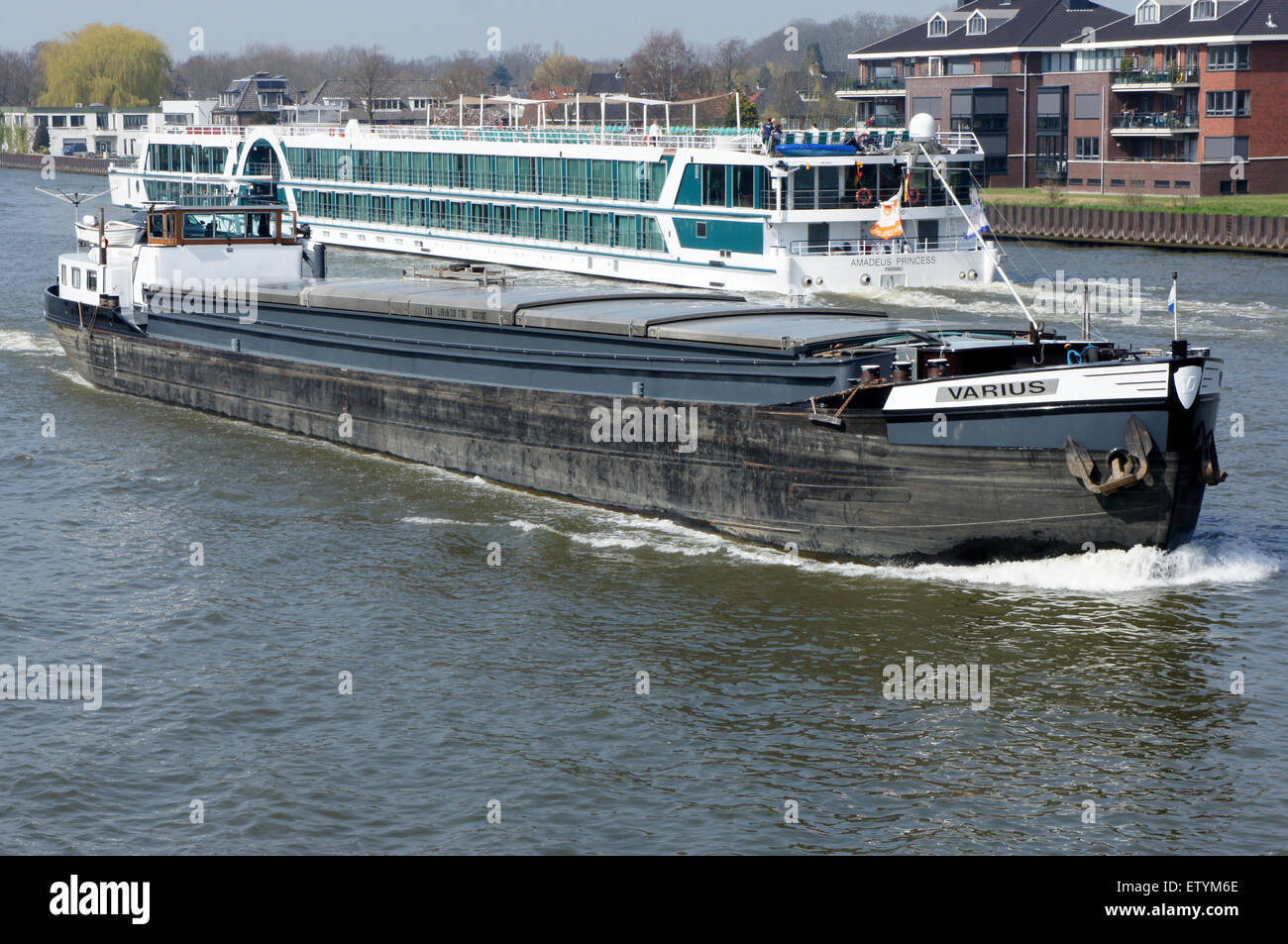 The image shows a tanker ship, ENI 02311307, navigating the Amsterdam ...