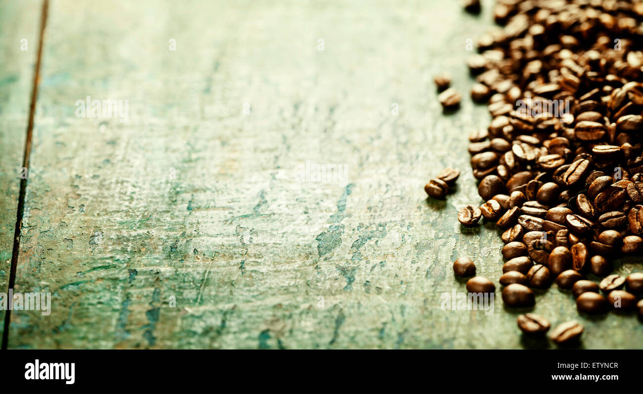 Coffee on grunge wooden background Stock Photo - Alamy