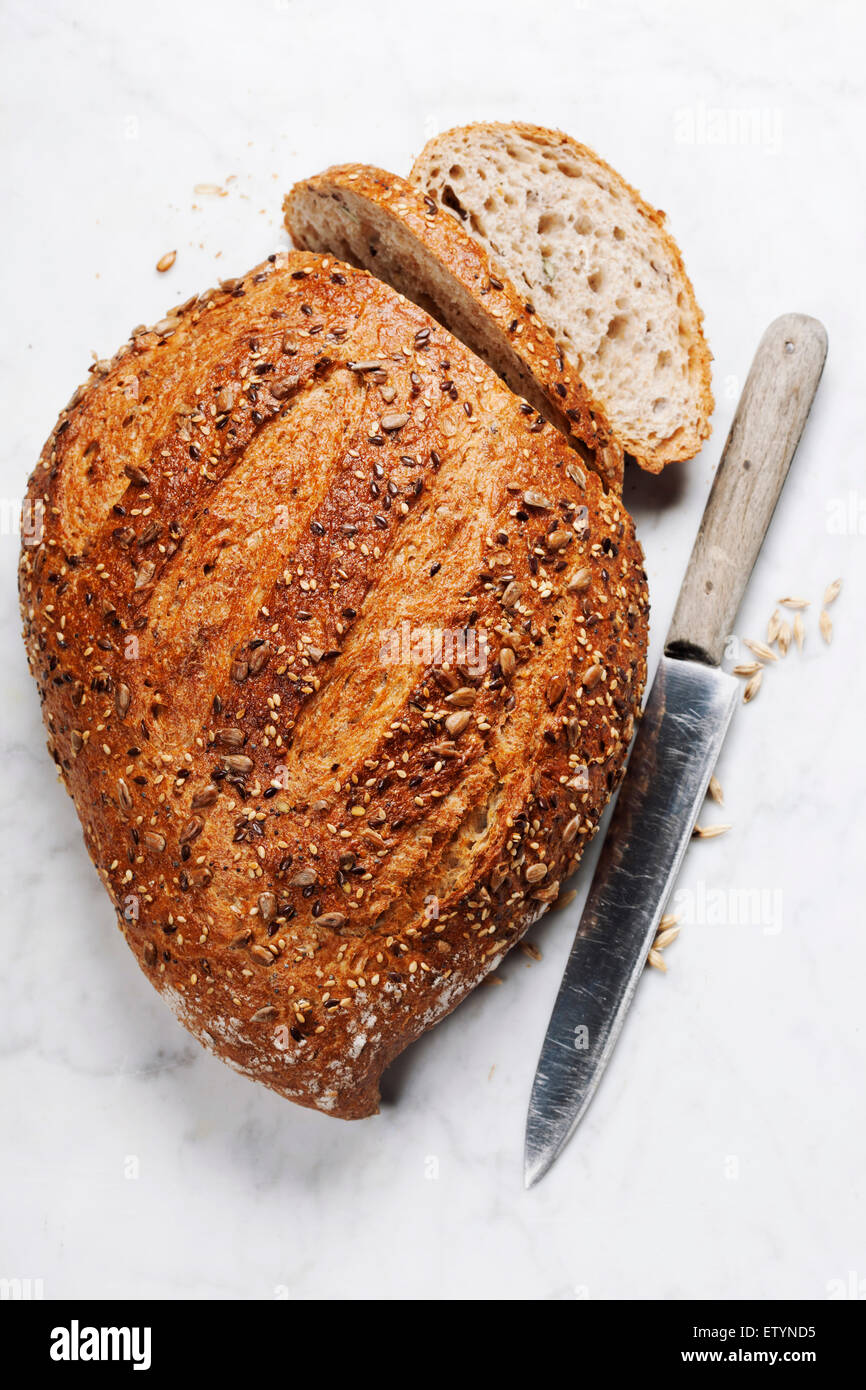 Large loaf of bread on white marble background Stock Photo - Alamy